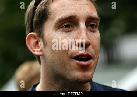 British Olympic swimmer Stephen Parry shows off his bronze medal won in ...