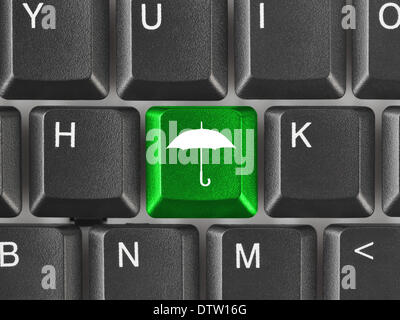 Computer keyboard with umbrella key Stock Photo - Alamy
