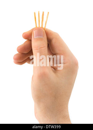 Hand and matches - draw lots Stock Photo - Alamy