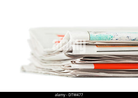 Stack of newspapers Isolated on white background Stock Photo - Alamy
