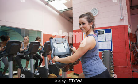 a woman teaches spinning class Stock Photo - Alamy