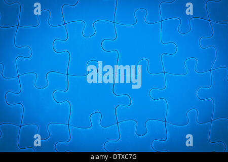 Flat blue jigsaw puzzle Stock Photo - Alamy