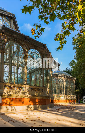 sunset with the background the crystal palace of the retiro park in the ...