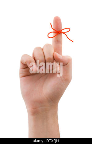 red bow on male finger showing reminder or dont forget concept in white ...