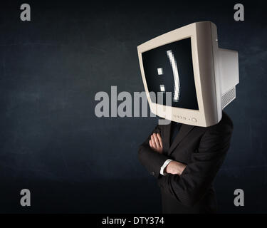 Funny young businessman with a monitor on his head and smiley on the ...