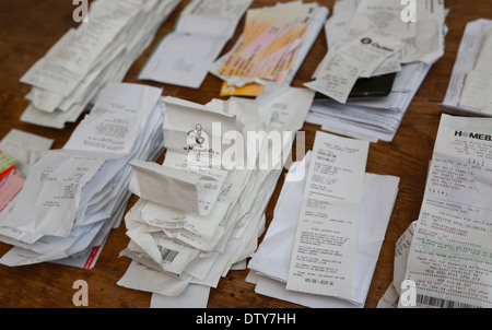 Piles of receipts ready for accounting Stock Photo - Alamy