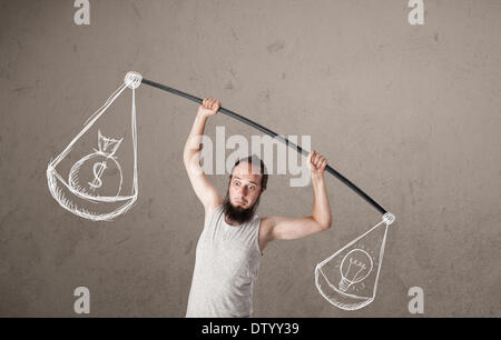 skinny guy trying to get balanced Stock Photo - Alamy