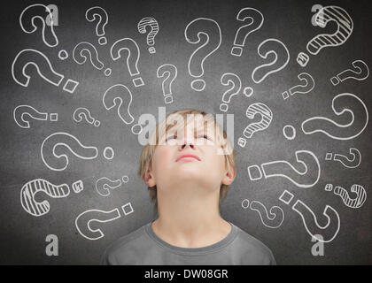 Confused child thinking Stock Photo - Alamy