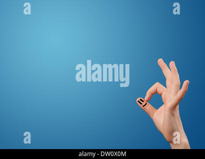 Happy finger smileys with empty blue bokeh background Stock Photo - Alamy