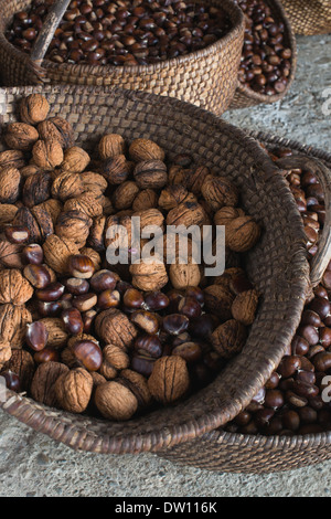 Noble chestnuts and walnuts in a basket Stock Photo - Alamy