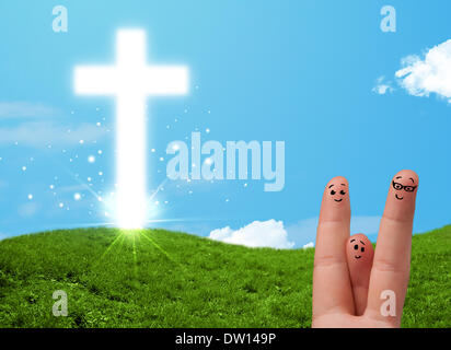 Happy finger smileys with christian religion cross Stock Photo - Alamy