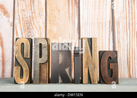 spring written with vintage used print letters and tulips Stock Photo ...