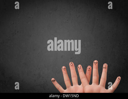 Happy finger smileys with empty copy space dark background Stock Photo ...