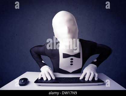 Man without identity working with keyboard on blue background Stock ...