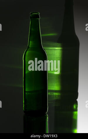 green bottle with colored reflection Stock Photo - Alamy