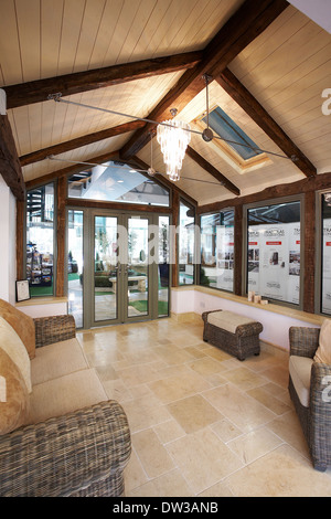 Inside an orangery type conservatory with a glass skylight window and ...