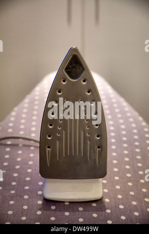Holes on the bottom of an iron Stock Photo - Alamy