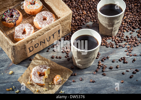 Fresh donuts to take away Stock Photo - Alamy