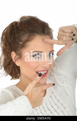 Woman framing her face with hands Stock Photo - Alamy