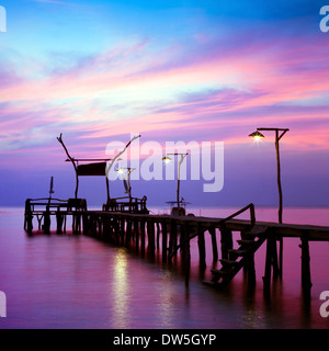 Beautiful seascape in purple sunset light. Lake, sea, islands ...