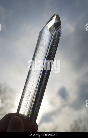 A synthetic quartz crystal grown by the hydrothermal method in a lab ...