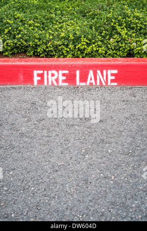 Curb with Fire Lane painted on Stock Photo - Alamy
