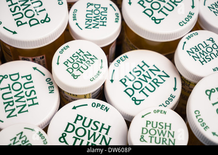 Childproof tops of many prescription bottle of medication Stock Photo ...