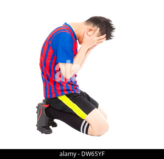 Sad footballer man crying Stock Photo - Alamy