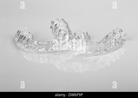 Translucent upper essix retainer on a plaster study model placed on a ...