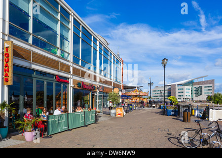 People eating outdoors at Nando's cafe, Cardiff Bay, Wales, UK Stock ...