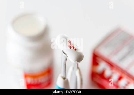 Tylenol pill and container with safety seal Stock Photo - Alamy