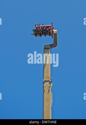 Claw which is a ride that spins people upside down. a carnival ride on ...