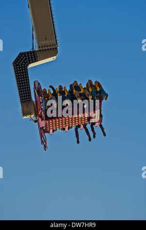 Claw which is a ride that spins people upside down. a carnival ride on ...