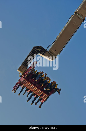 Claw which is a ride that spins people upside down. a carnival ride on ...