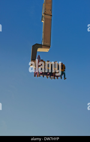 Claw which is a ride that spins people upside down. a carnival ride on ...