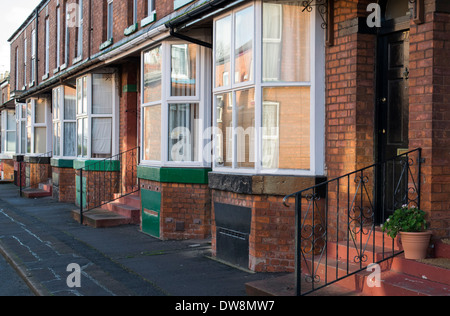 A street of terraced houses in Manchester with a new office Stock Photo ...