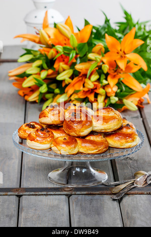 Traditional swedish buns in autumn setting. A saffron bun, lussebulle ...