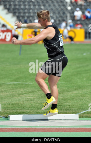 Matthew Bloxham from New Zealand performs the shot put during the 2013 ...