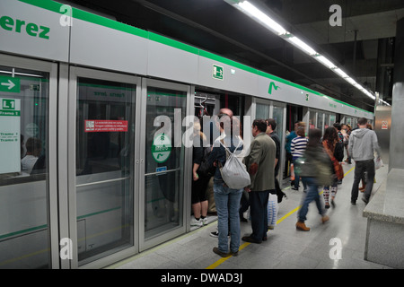 Typical enclosed Metro train platform with a train in the station ...