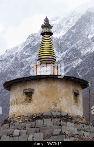 Stupa, also known as Chorten, and mani stones in the Tsum Valley, Nepal ...