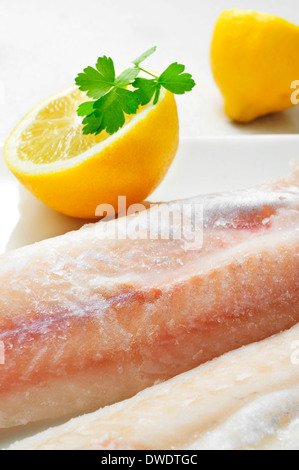 Raw hake fillets Stock Photo - Alamy