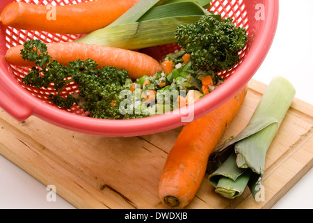Carrots with leek in the sieve Stock Photo - Alamy