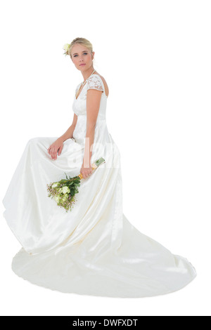 Portrait of bride holding bouquet Stock Photo - Alamy