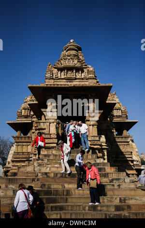 Tourists visit the Khajuraho group of monuments in Madhya Pradesh of ...