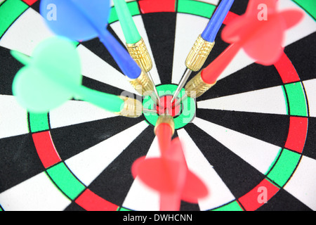 Many Darts on Target Stock Photo - Alamy