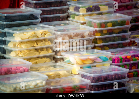 Sugary sweets available for sale at cheap prices on market stall ...