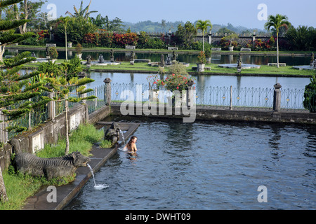 Bali, Indonesia. Woman Bathing at Tirta Empul, a Spring Sacred to ...