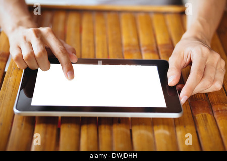 Kid hands holding white tablet computer on light blue background Stock ...