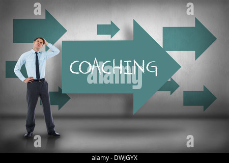 The word coaching and thoughtful businessman with hand on head against ...