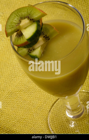 green vegetable or fruit smoothie, glass of fresh juice on white ...